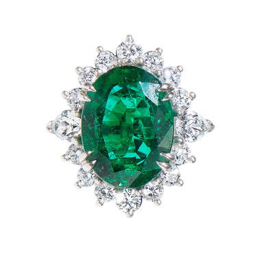 Emerald ring surrounded by diamonds store